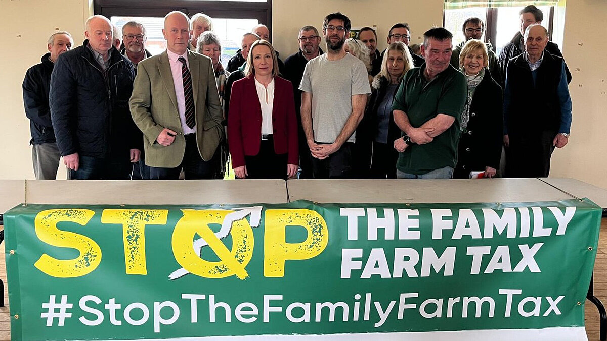 Helen addresses a packed meeting of local farmers over Family Farm Tax ...